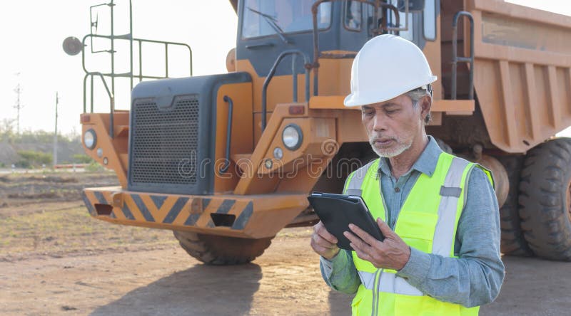Portrait of a Senior Mining Engineer Using a Tablet Stock Image - Image ...