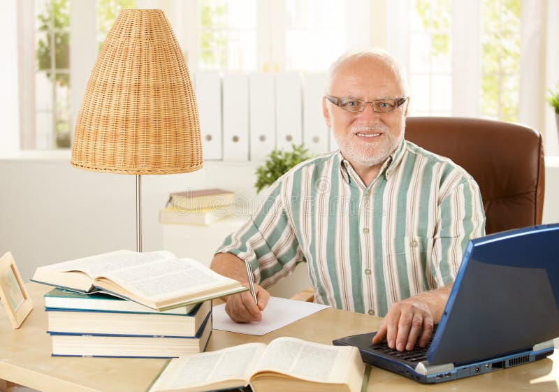 Portrait of Senior Professor Sitting at Desk Stock Photo - Image of ...