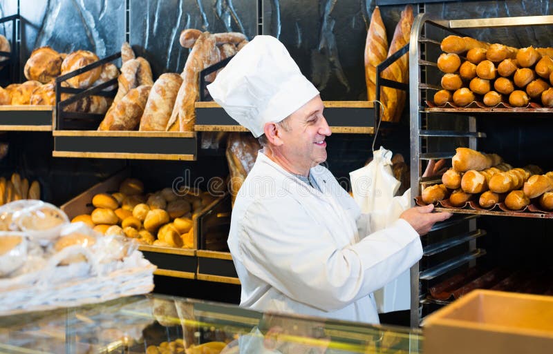 Portrait of Baker with Fresh Bread Smiling in Bakery Stock Image ...