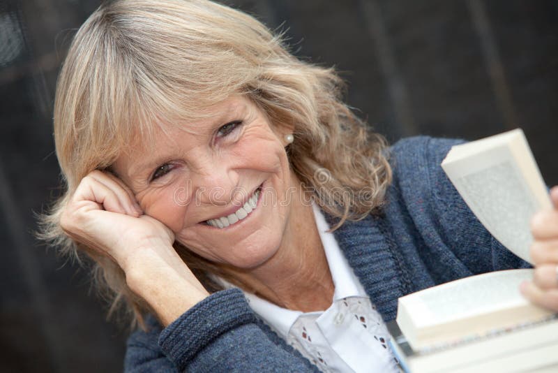 Senior Woman Reading with Books Stock Image - Image of woman, senior ...