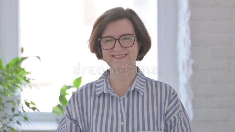 Portrait of Senior Woman Smiling at Camera Stock Photo - Image of ...