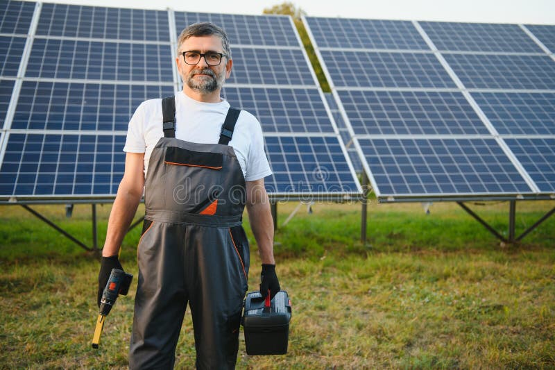 Portrait of Senior Worker in Uniform Standing Near Solar Panels Stock ...