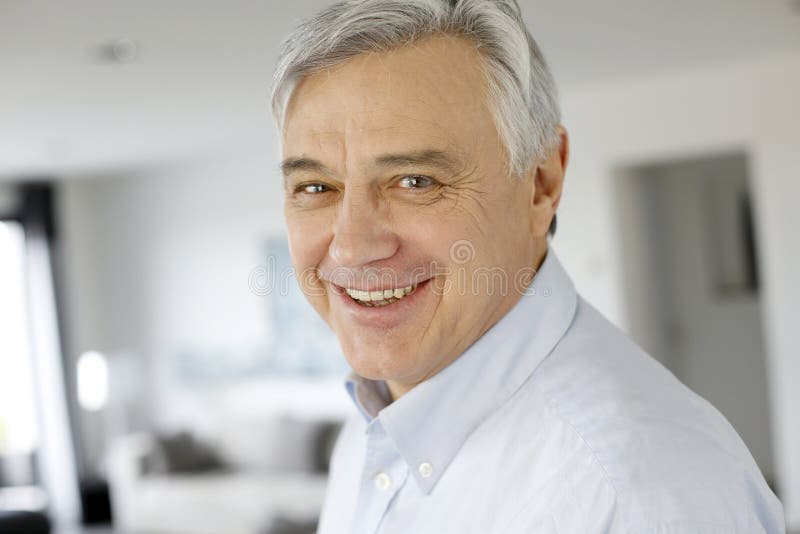 Portrait of Serene Smiling Man at Home Stock Photo - Image of leaning ...