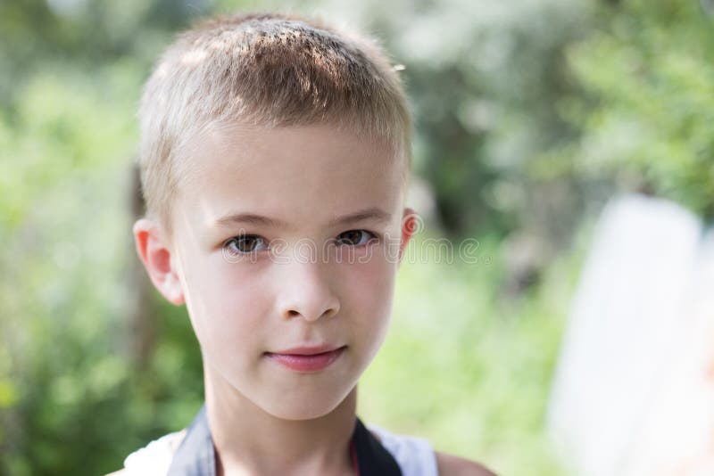 Portrait of a Serious Child Boy Outdoors Stock Image - Image of child ...