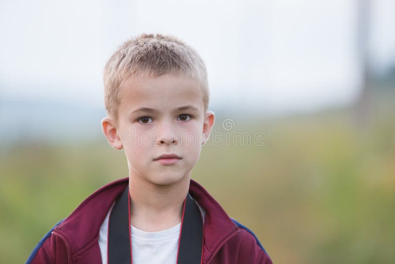 Portrait of a Serious Child Boy Outdoors Stock Photo - Image of face ...