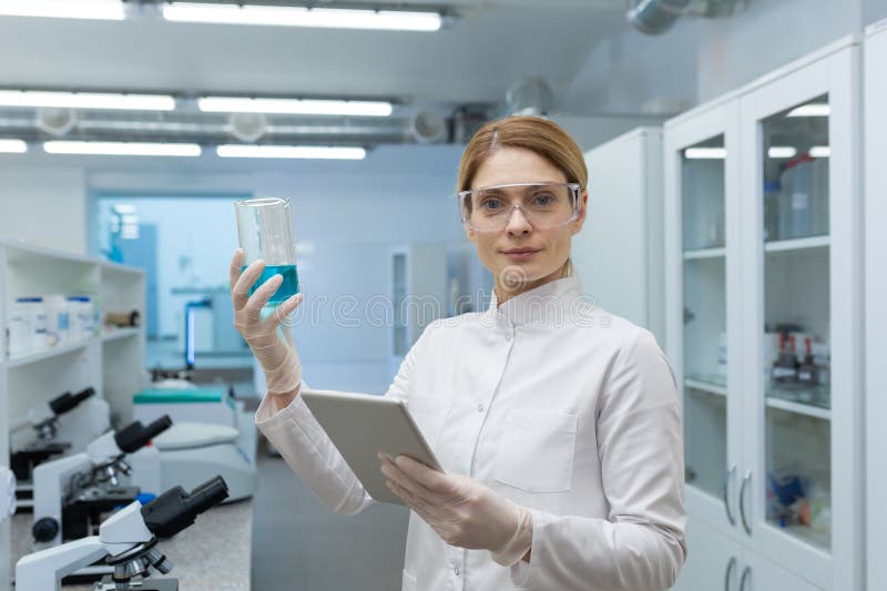 Portrait of Serious Confident Female Research Lab Worker Looking at ...