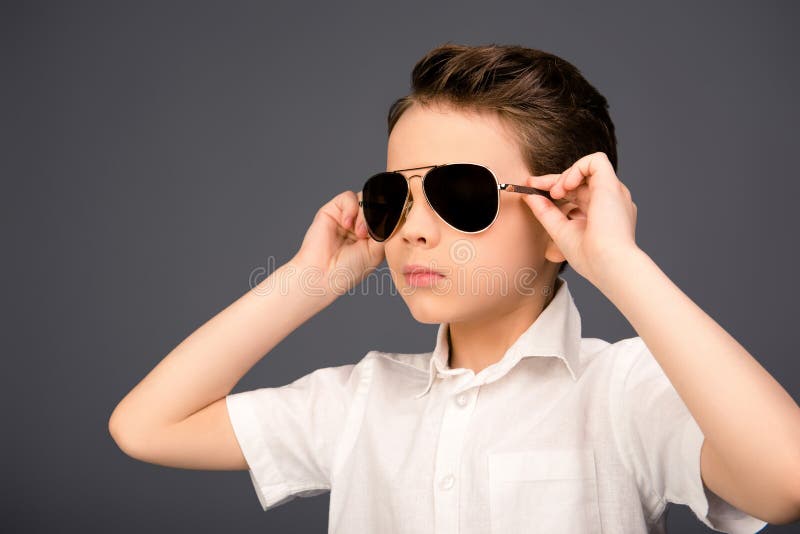 Portrait of Serious Cool Kid Touching His Spectacles Stock Image ...