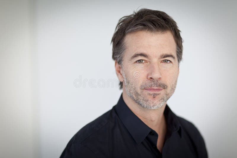 Portrait of a Serious Handsome Man Isolated on White Stock Image ...