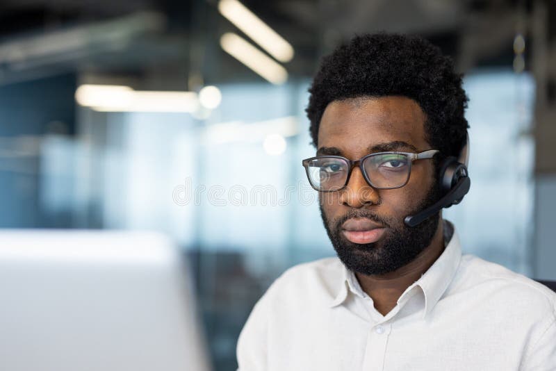 Portrait of Serious Thinking Man with Headset, Office Worker Looking at ...