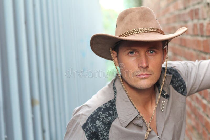 Cowboy Man Handsome And Good Looking With Hat, Overalls And Plaid Shirt ...