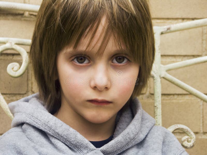 Portrait of Serious Young Boy Stock Image - Image of expression ...