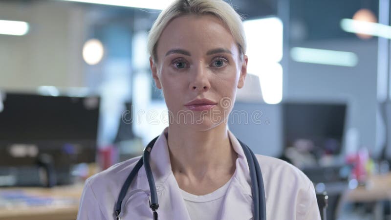 Portrait of Serious Young Female Doctor Looking at the Camera Stock ...