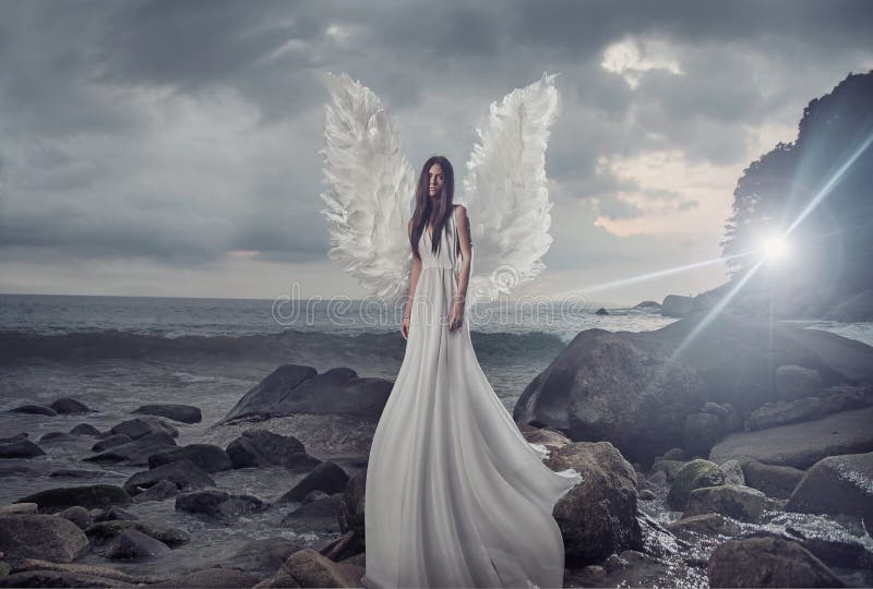 Portrait of the Shining Angel on the Sharp Rock Stock Photo - Image of ...