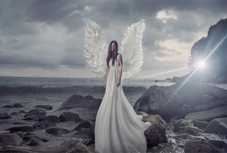 Portrait of the Shining Angel on the Sharp Rock Stock Photo - Image of ...