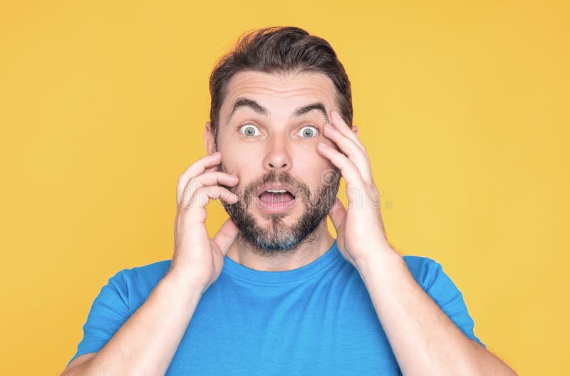 Portrait Of Shocked Unshaven Caucasian Man Afraid And Shocked With