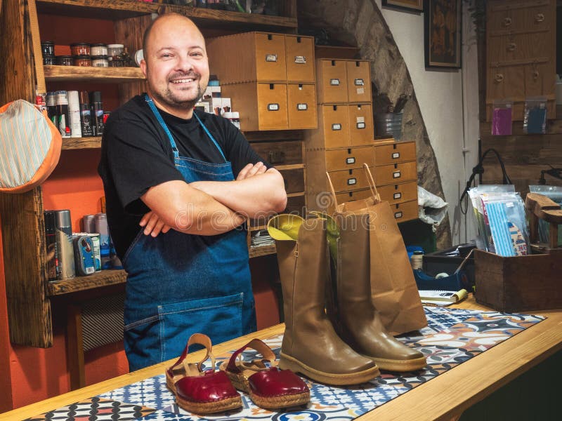 Portrait of a Shoemaker in His Shop Looking at the Camera Stock Photo ...