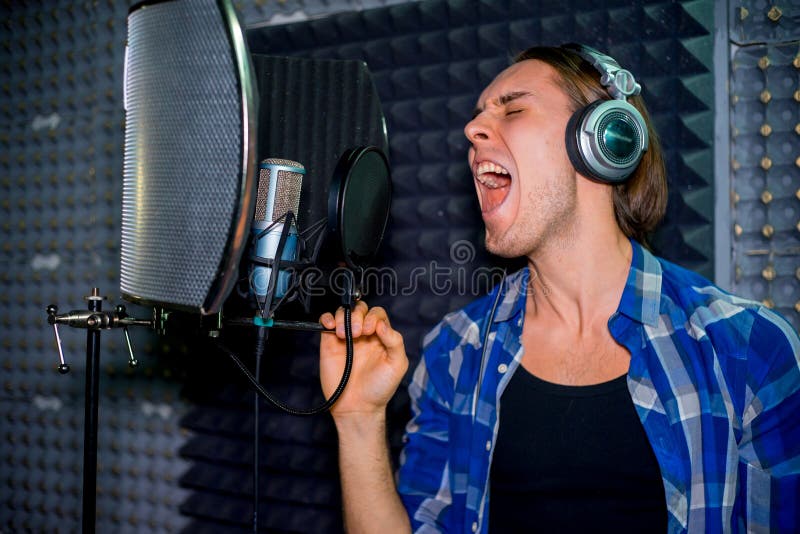 Singer in a Recording Studio Stock Photo - Image of keyboard ...