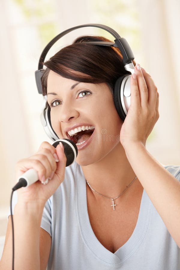 Singing Woman stock image. Image of recording, young, beautiful - 3454183