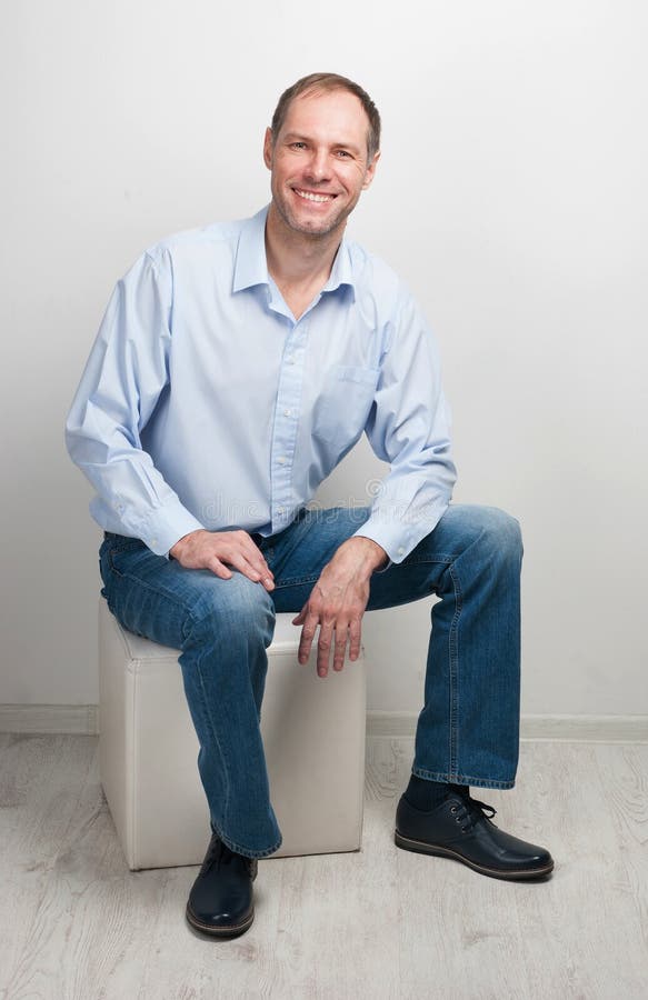 Portrait of sitting man stock photo. Image of attractive - 35669794