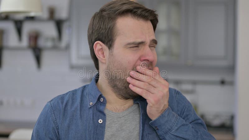 Portrait of Sleepy Beard Young Man Yawning in Office Stock Photo ...
