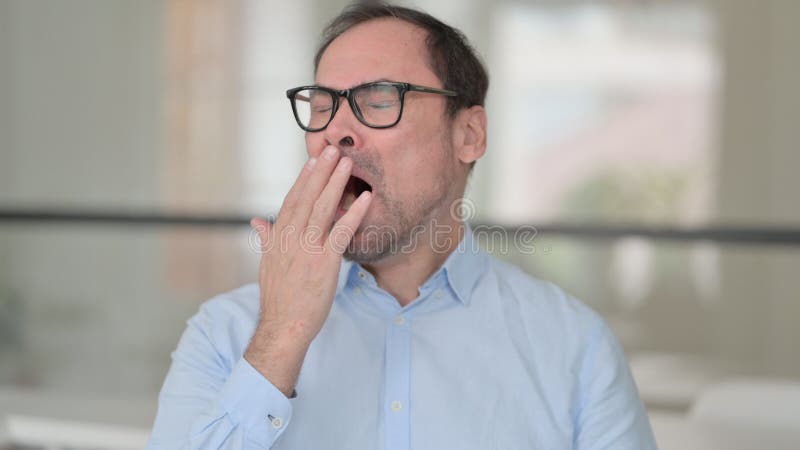 Portrait of Sleepy Middle Aged Man Yawning Stock Image - Image of ...