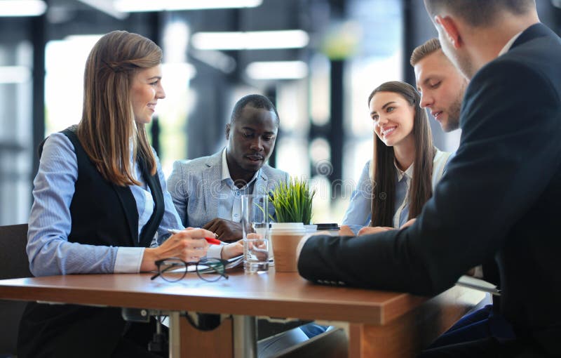 Portrait of Smart Business Partners Planning Work at Meeting Stock ...