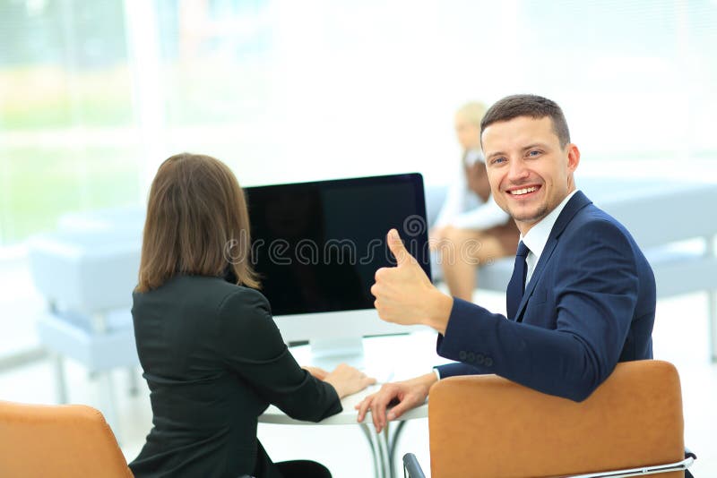 Portrait of Smart Business Partners Using Computer at Meeting a Stock ...