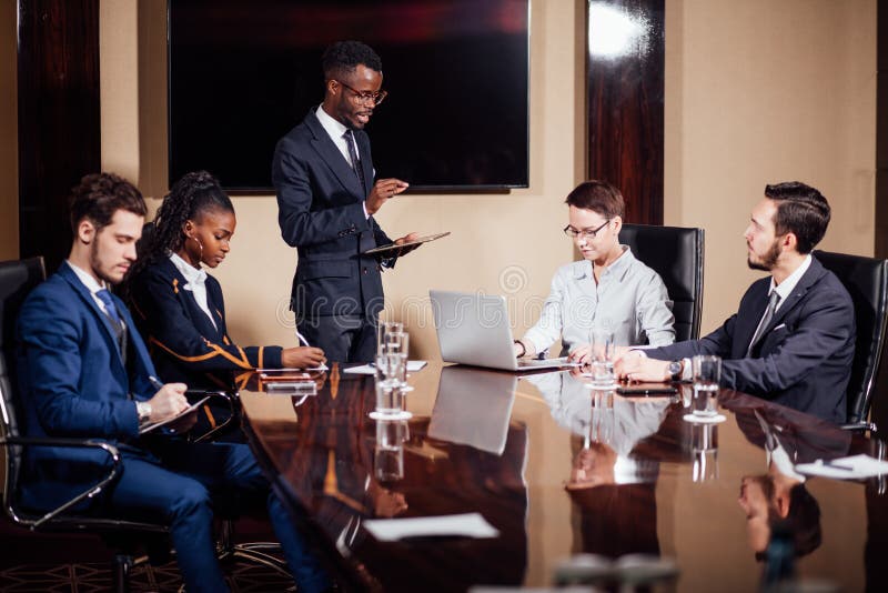 Smart Business Partners Using Laptop at Meeting Stock Image - Image of ...