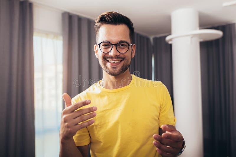 Smart Confident Smiling Millennial Man Standing at Home Stock Image ...