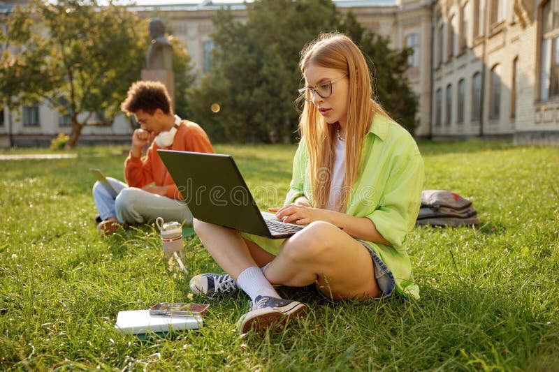 Portrait of Smart Millennial Student Using Laptop while Studying ...