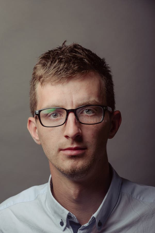 Portrait of a Smart Serious Young Man Stock Image - Image of face, hand ...