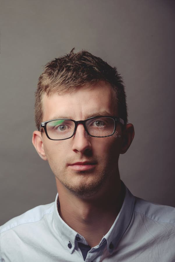 Portrait of a Smart Serious Young Man Stock Photo - Image of people ...