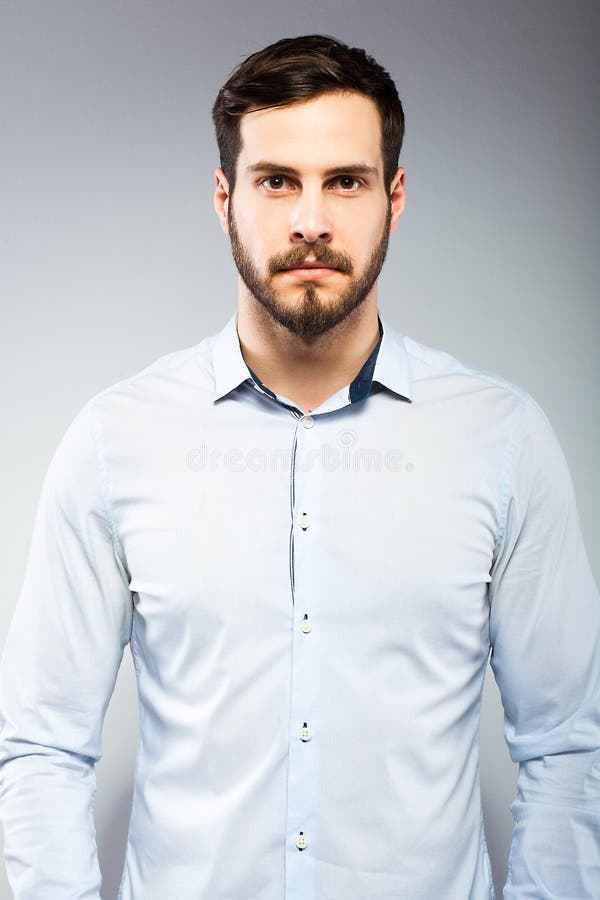 Portrait of a Smart Serious Young Man Standing Stock Image - Image of ...