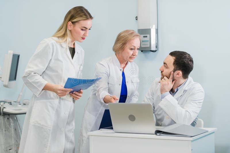 Portrait of a Smart Young Doctors Works in a Hospital Stock Photo ...