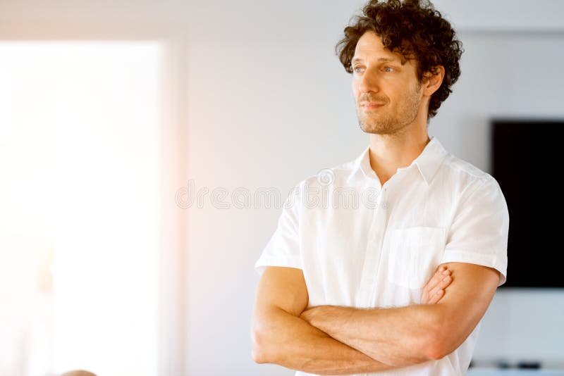 Portrait of a Smart Young Man Standing in Kitchen Stock Photo - Image ...