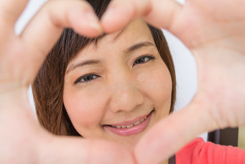 Portrait of a Smiling Asian Girl with Frame Hands Stock Image - Image ...