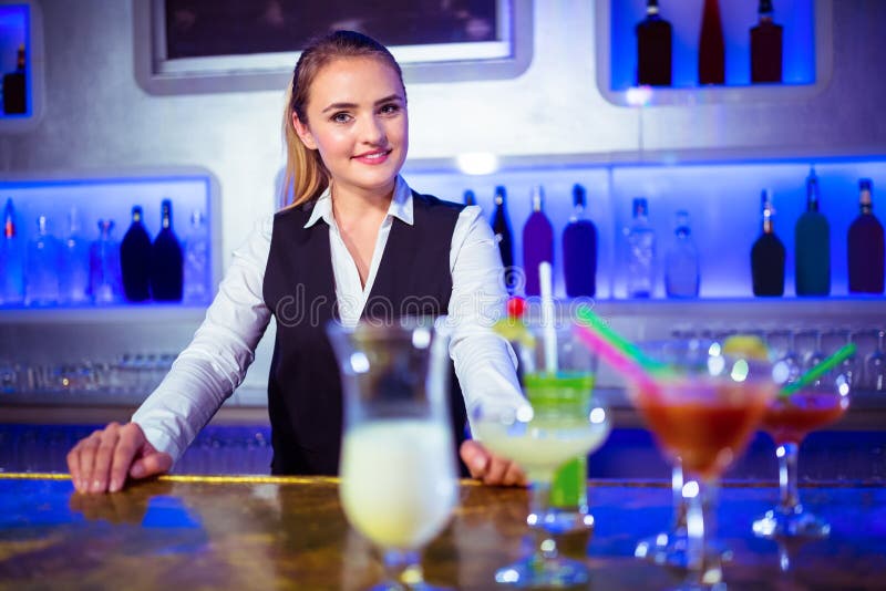 Portrait of Smiling Barmaid Standing Stock Image - Image of camera ...