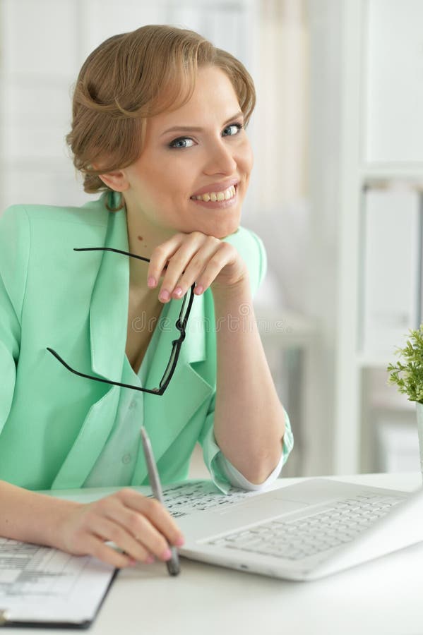 Portrait of a Smiling Beautiful Business Woman Using a Laptop. Stock ... Portrait of a Smiling Beautiful Business Woman Using a Laptop. Stock ...