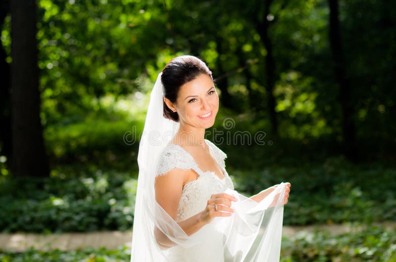 Portrait of the Smiling Bride in the Garden Stock Image - Image of ...