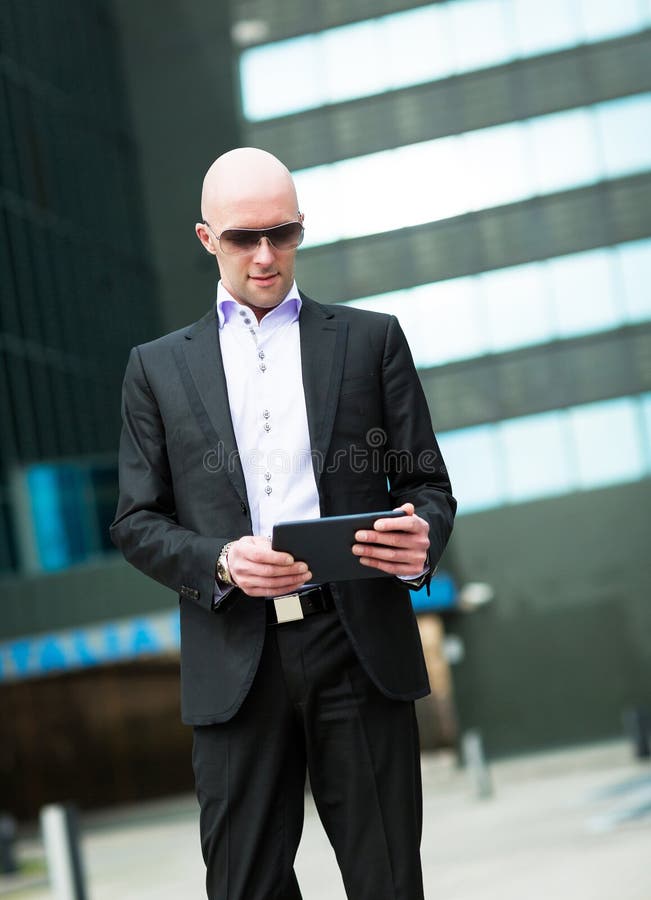 Portrait of Smiling Business Man Using Computer Tablet. Stock Image ...
