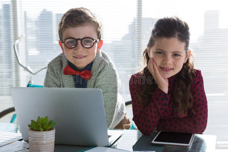Portrait of Smiling Business People Standing at Table Stock Photo ...