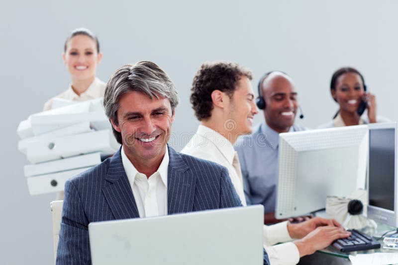 Portrait of a Smiling Business Team at Work Stock Photo - Image of ...