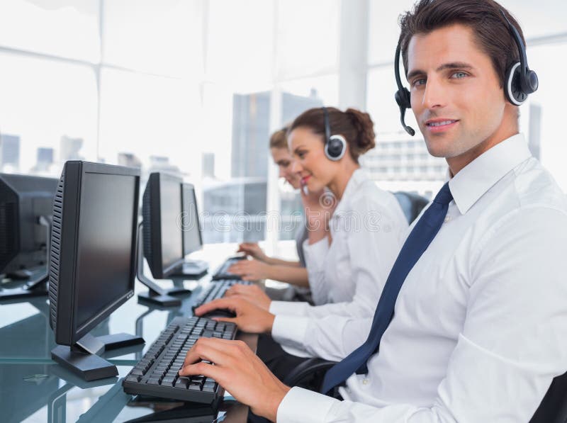 Portrait of Smiling Call Center Employee Stock Image - Image of ...