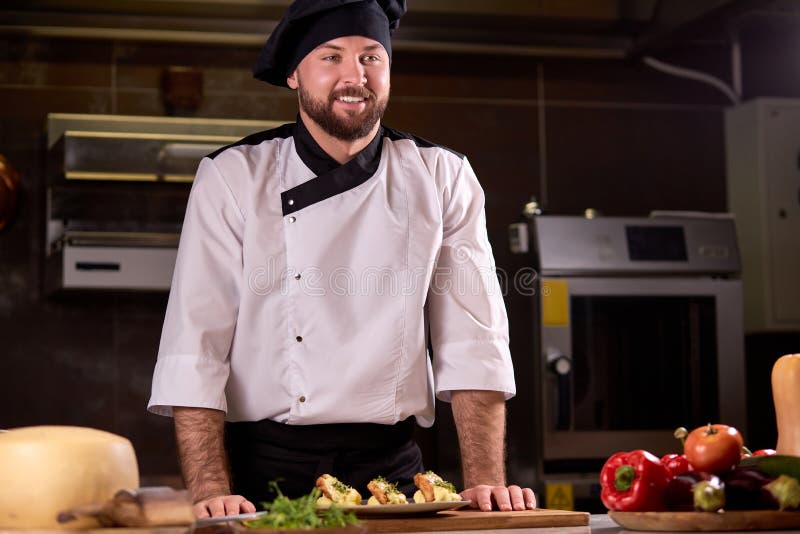 Portrait of Smiling Chef in Apron Satisfied with Work, Cooking Stock ...