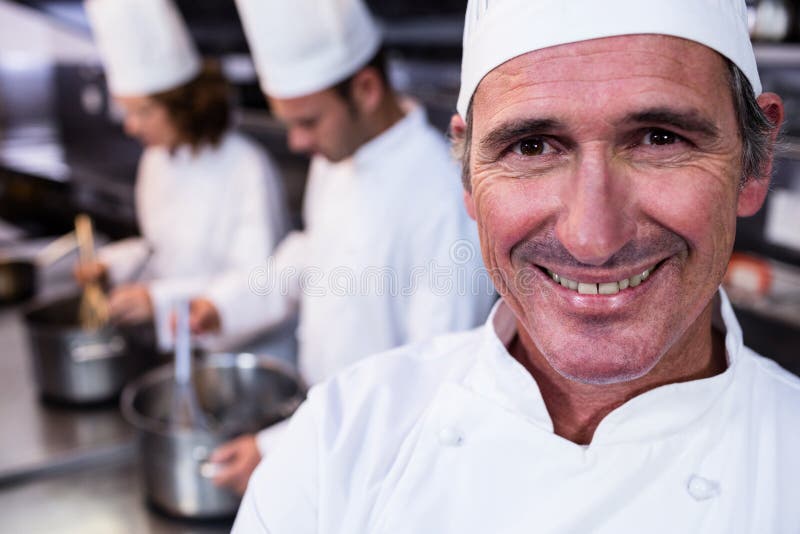 Portrait of Smiling Chef in Commercial Kitchen Stock Image - Image of ...