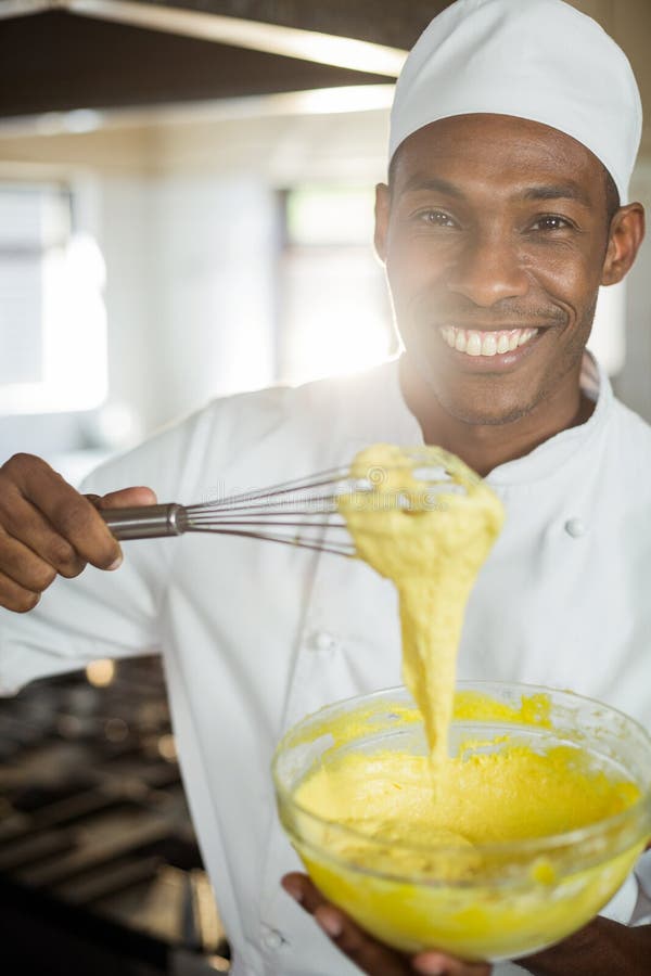 Portrait of Smiling Chef Mixing Dough Stock Image - Image of kitchen ...