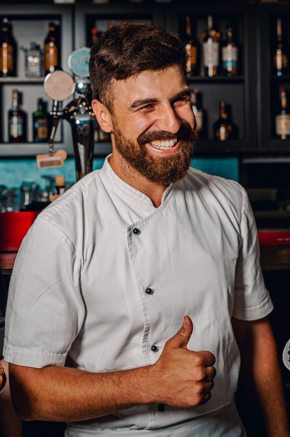 Portrait of smiling chef stock photo. Image of interior - 191674968