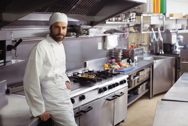 Portrait of Smiling Chef Standing in Commercial Kitchen Stock Image ...