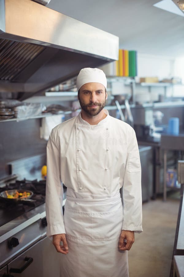 Portrait of Smiling Chef Standing in Commercial Kitchen Stock Photo ...