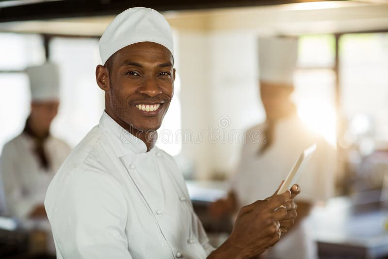 Portrait of Smiling Chef Using Digital Tablet Stock Image - Image of ...